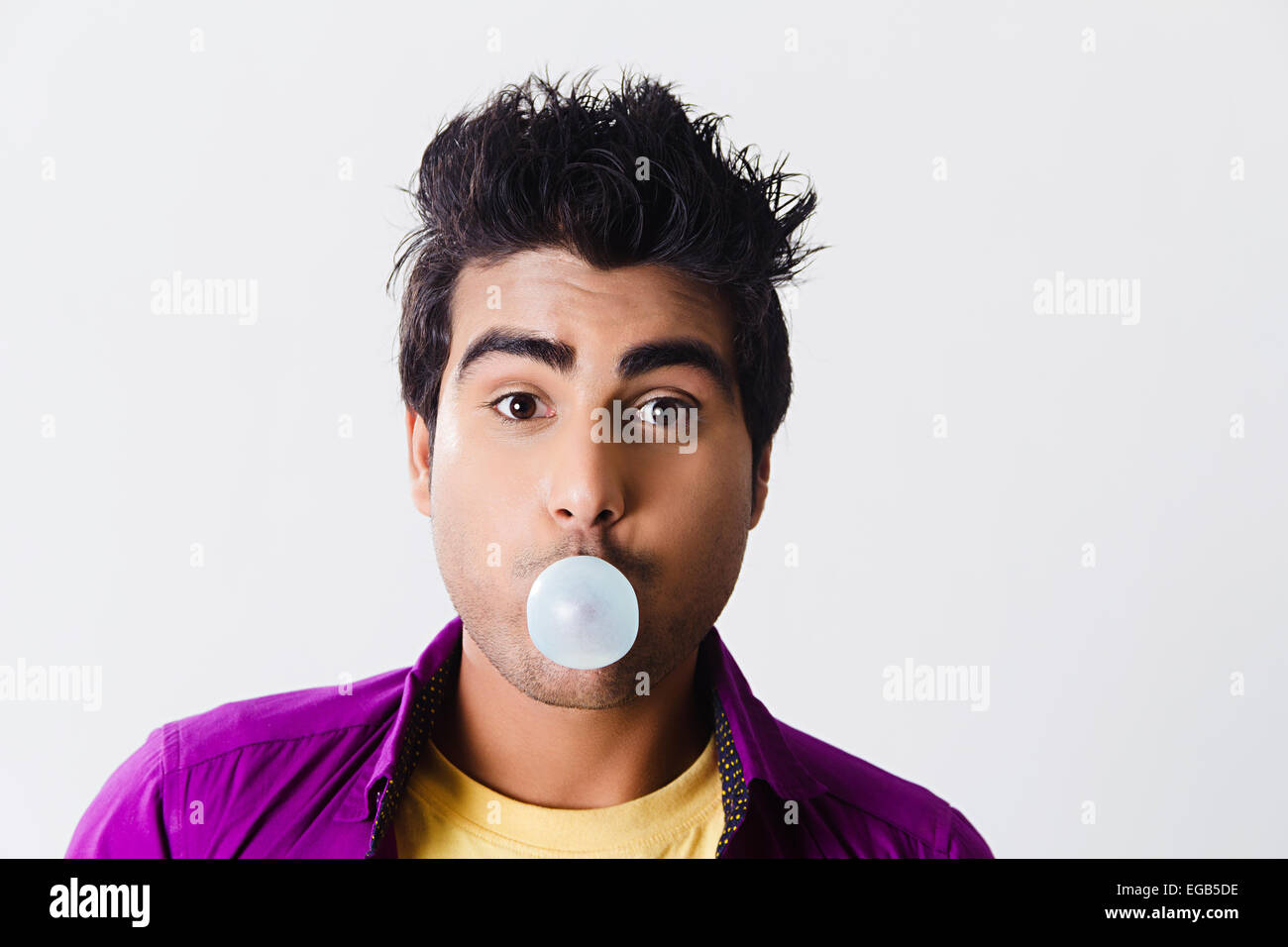 Indian man blowing bubbles hi-res stock photography and images - Alamy