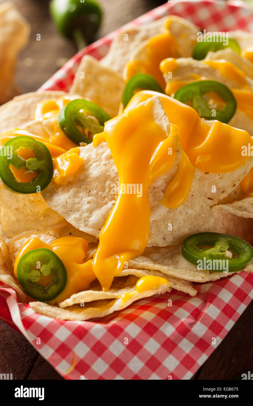Homemade Nachos with Cheddar Cheese and Jalapenos Stock Photo - Alamy