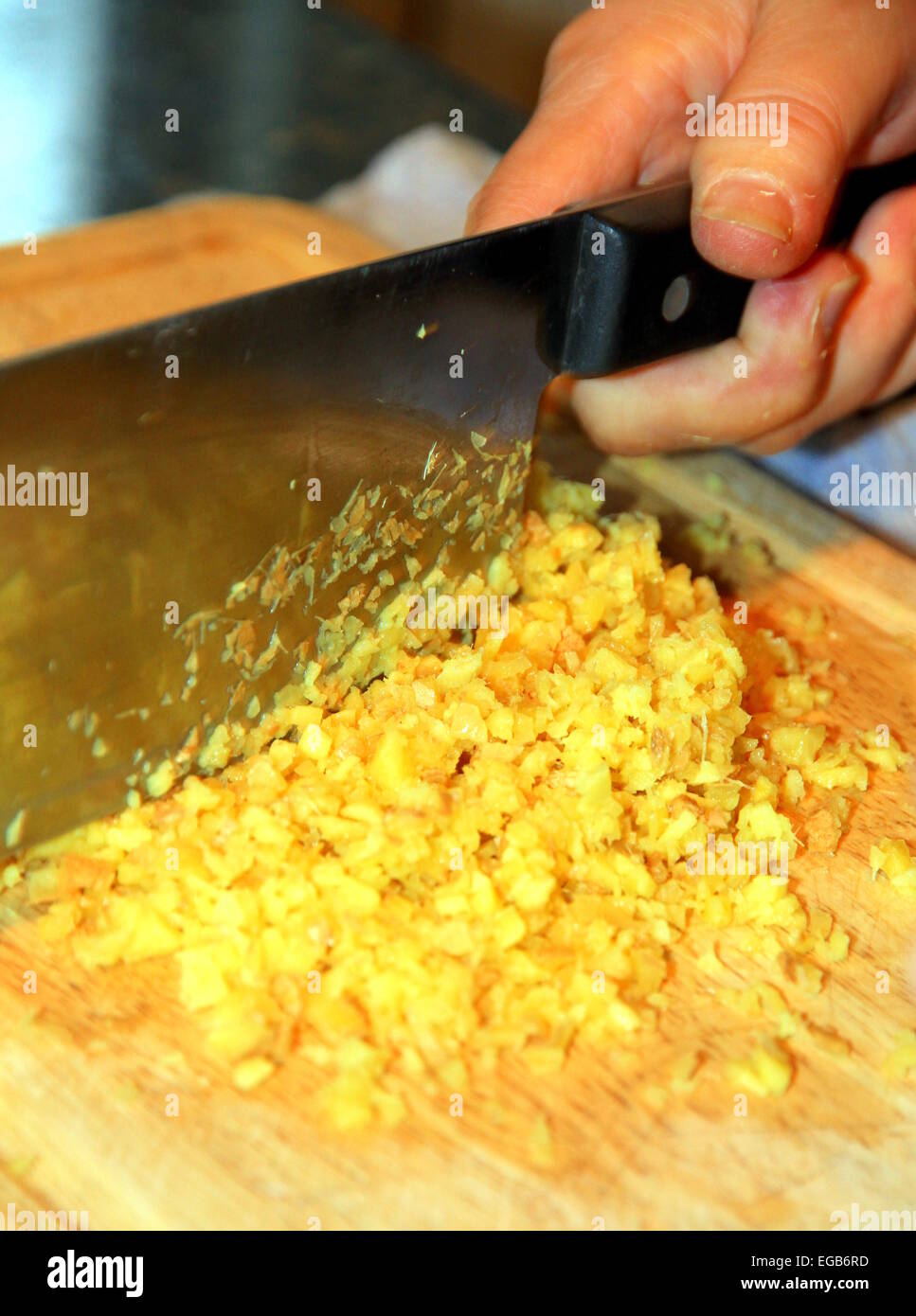 Chopped ginger on a cutter Stock Photo - Alamy