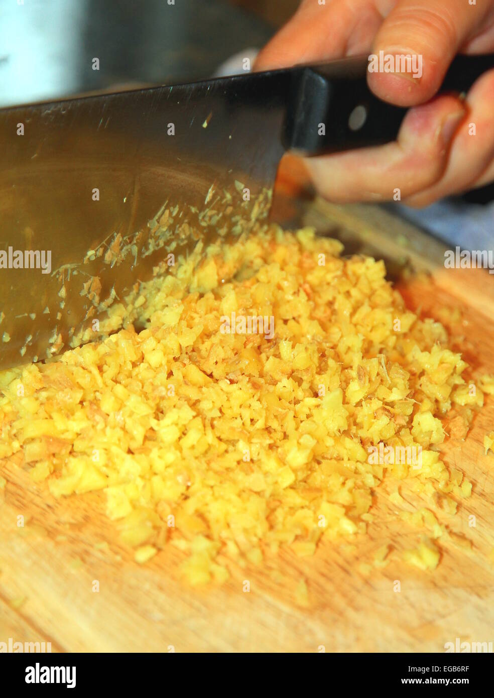 Chopped ginger on a cutter Stock Photo - Alamy