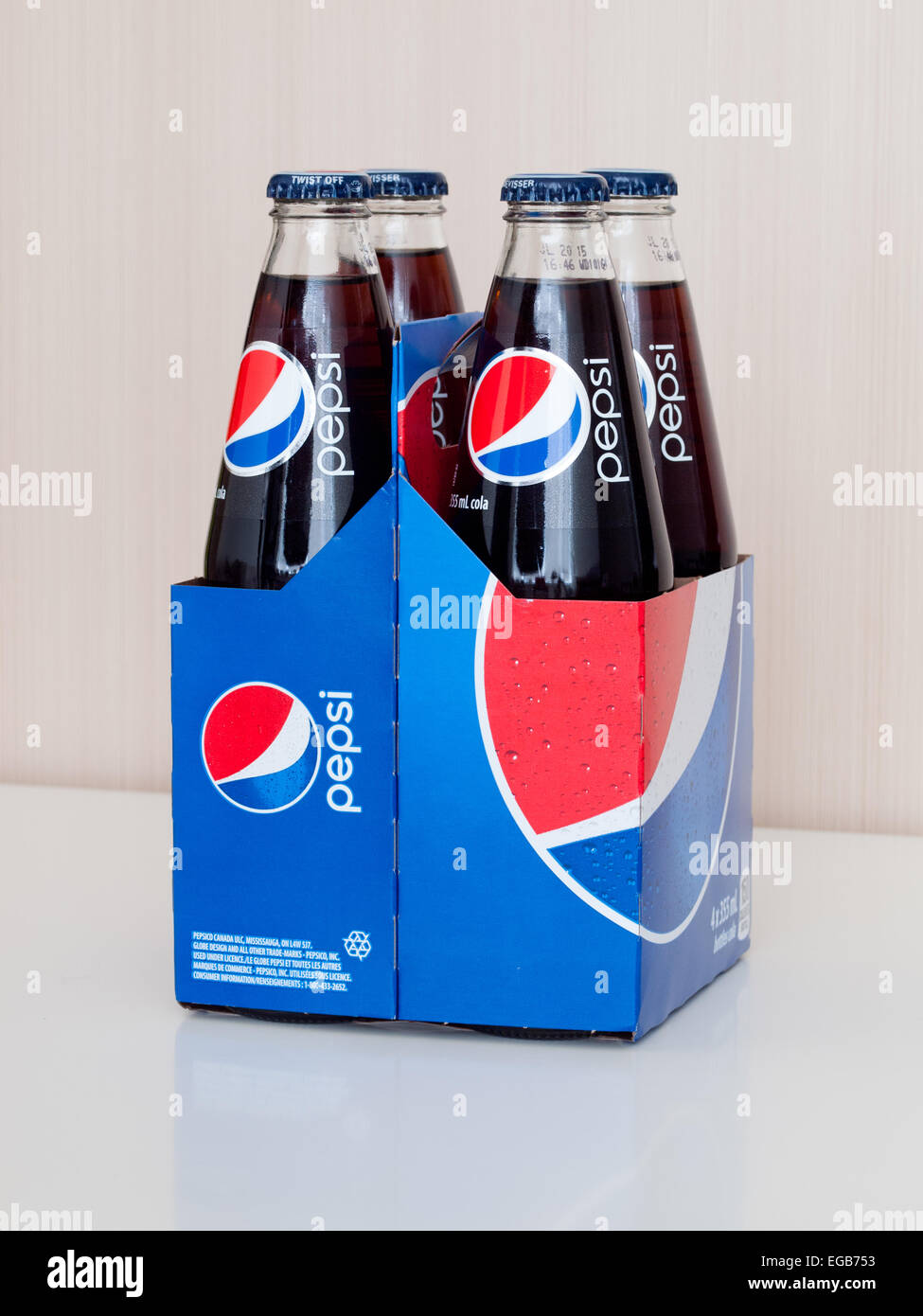 A 4-pack of 355 mL glass bottles of Pepsi (Pepsi-Cola). Canadian ...