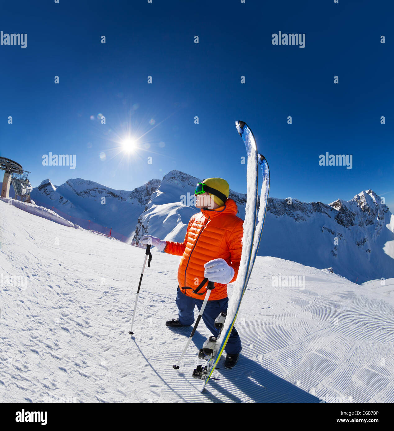 Man standing peak snowy mountain hi-res stock photography and images ...