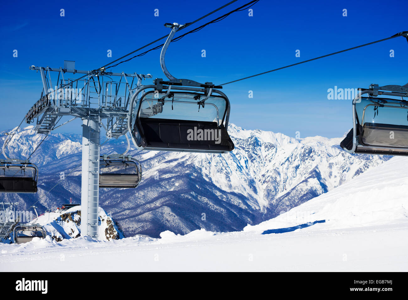 Chairs on chairlift ropeway in winter mountains Stock Photo - Alamy Chairs on chairlift ropeway in winter mountains Stock Photo - Alamy