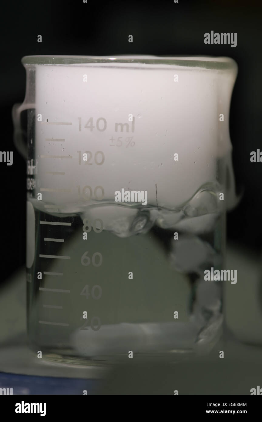 Dry ice reacting with the water placed in laboratory glassware Stock ...