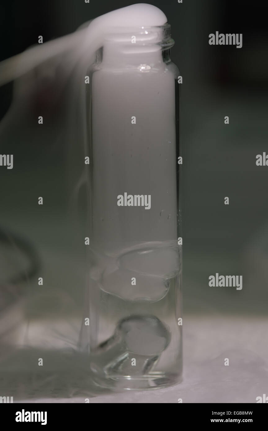 Dry ice reacting water in hi-res stock photography and images - Alamy