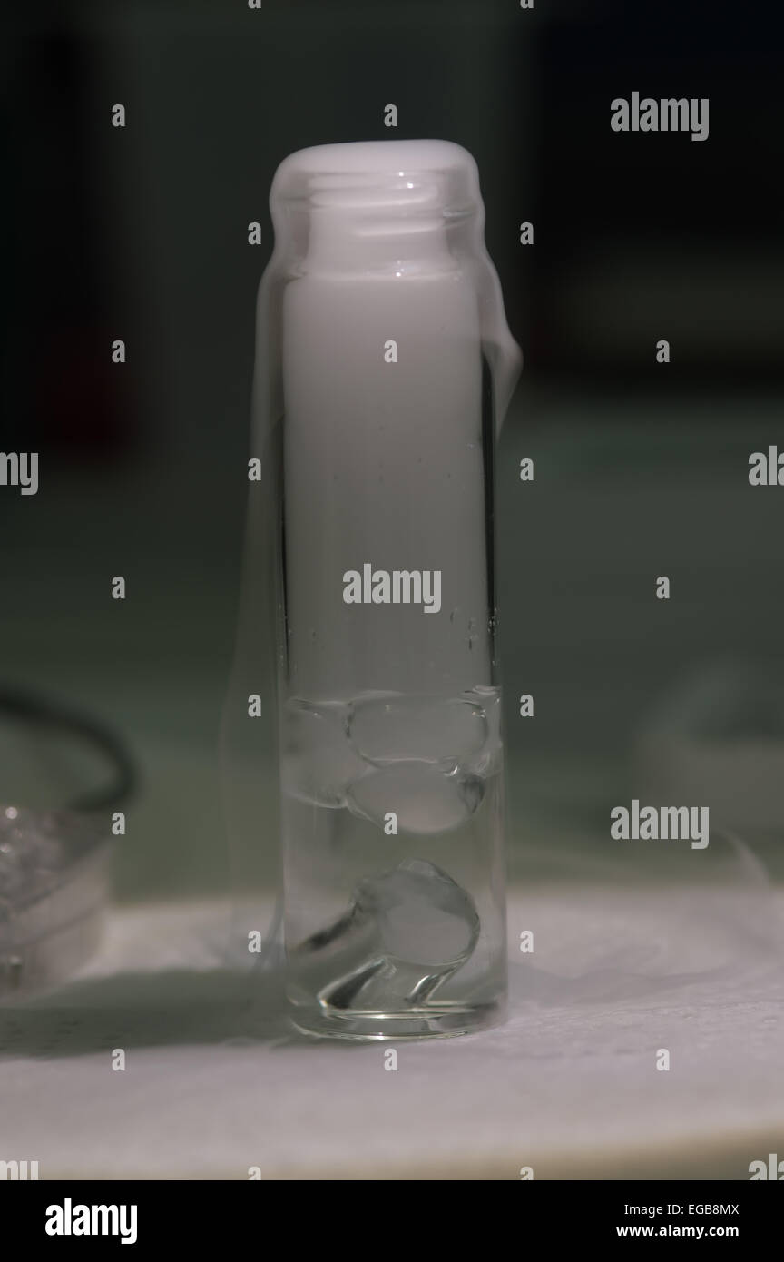Dry ice reacting with the water placed in laboratory glassware Stock ...