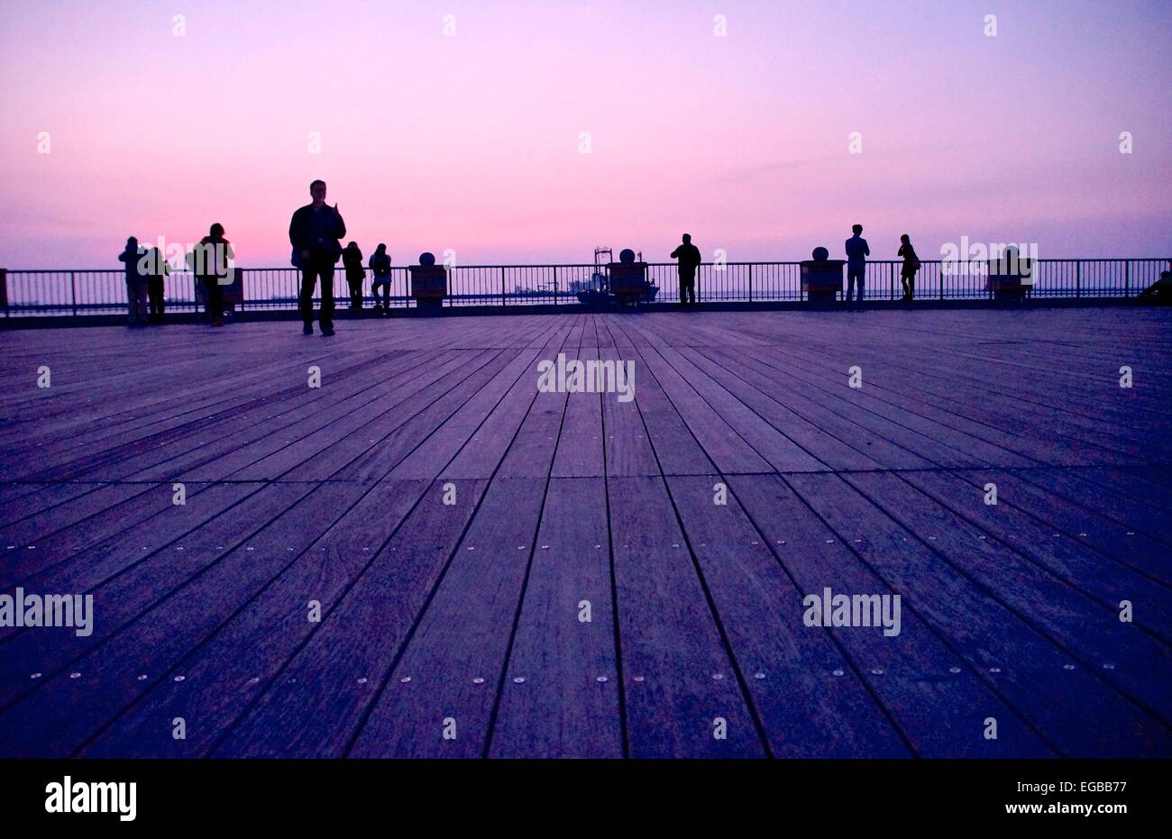 Crowd hanging around in tourist attraction at dusk in Taiwan Stock ...