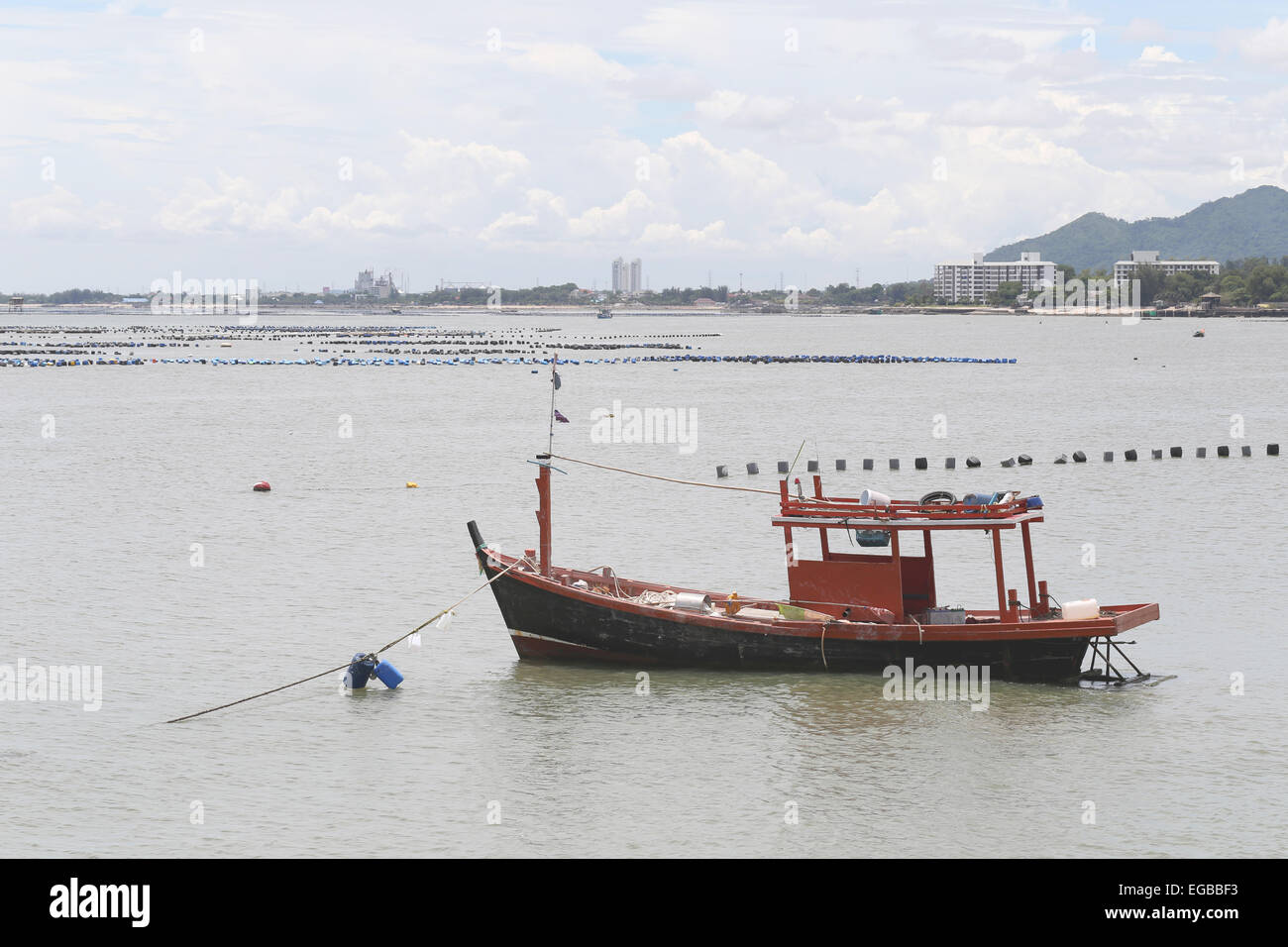 Small fishing boats in the sea Stock Photo - Alamy