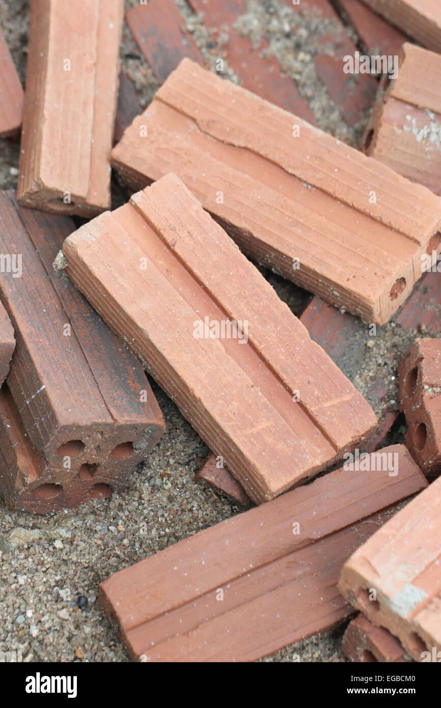 Fragments of bricks left over from construction Stock Photo - Alamy