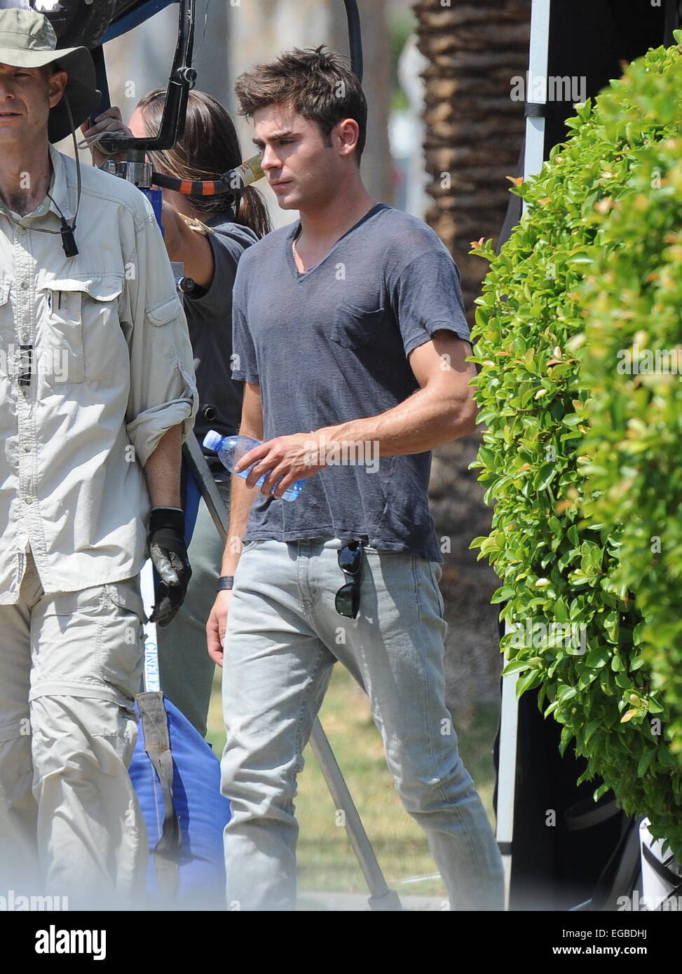 Zac Efron shows off his biceps on the set of his new movie "We Are Your ...