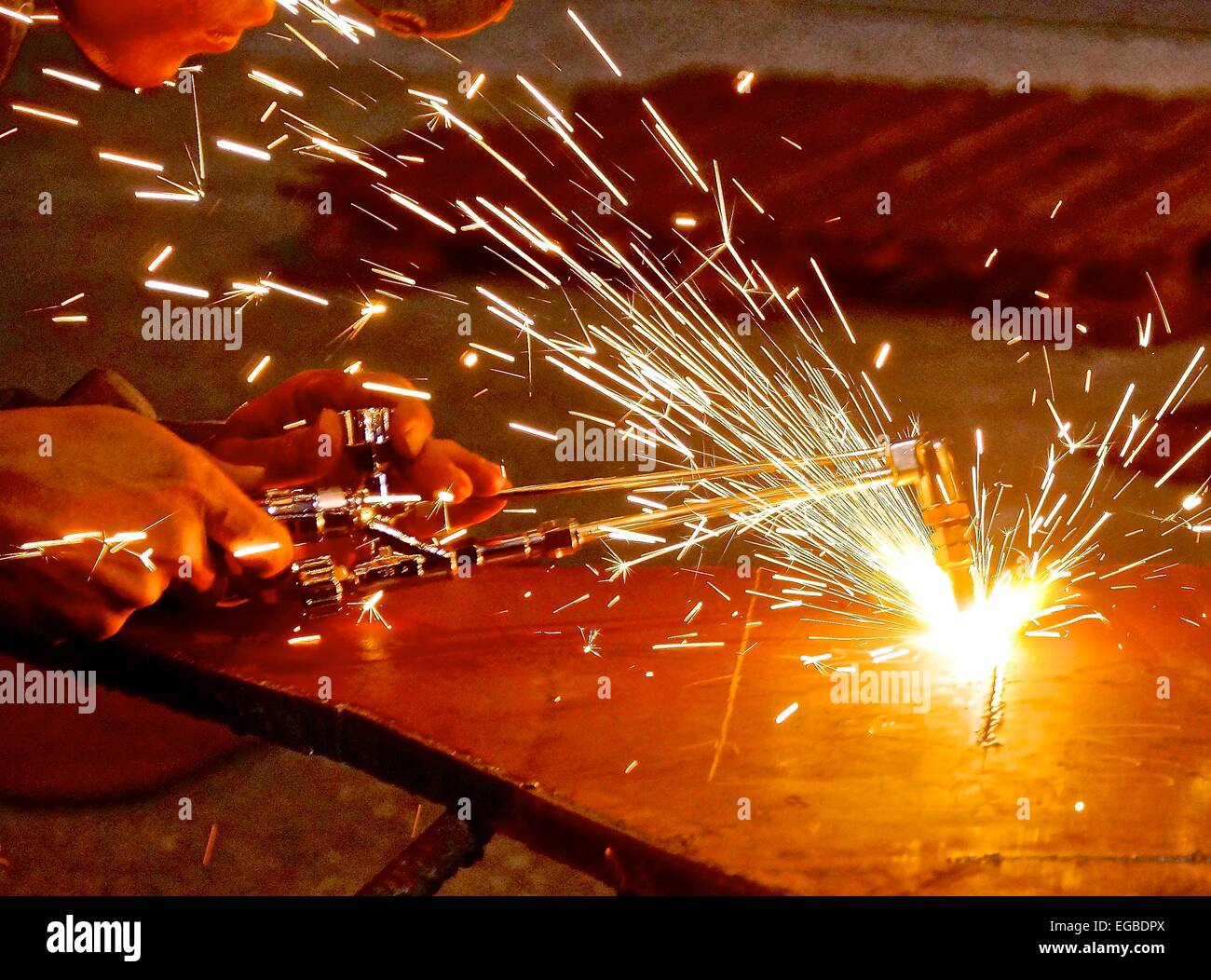 Oxygen and acetylene torch cutting steel with sparks Stock Photo - Alamy