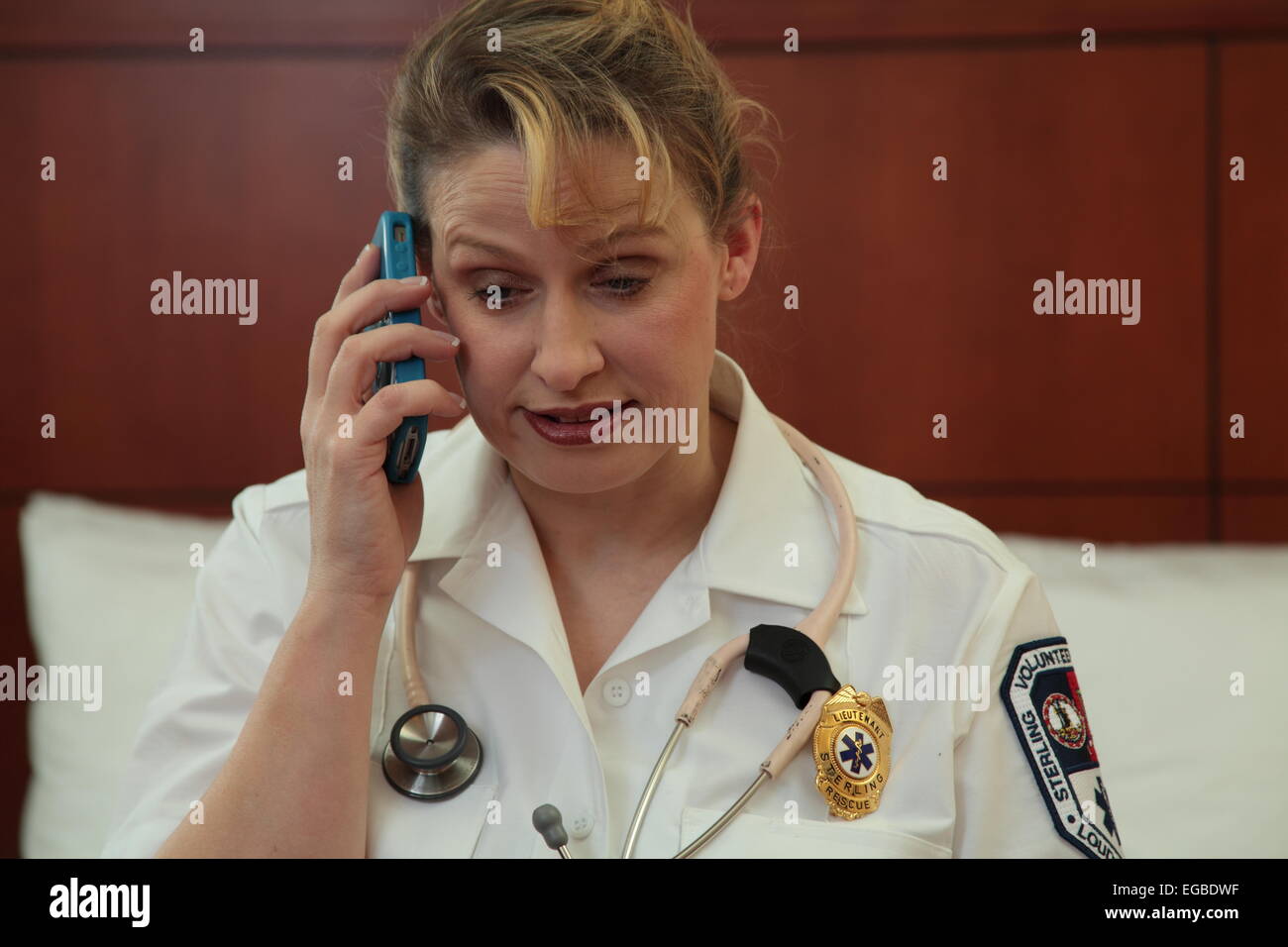 EMT on the phone Stock Photo - Alamy