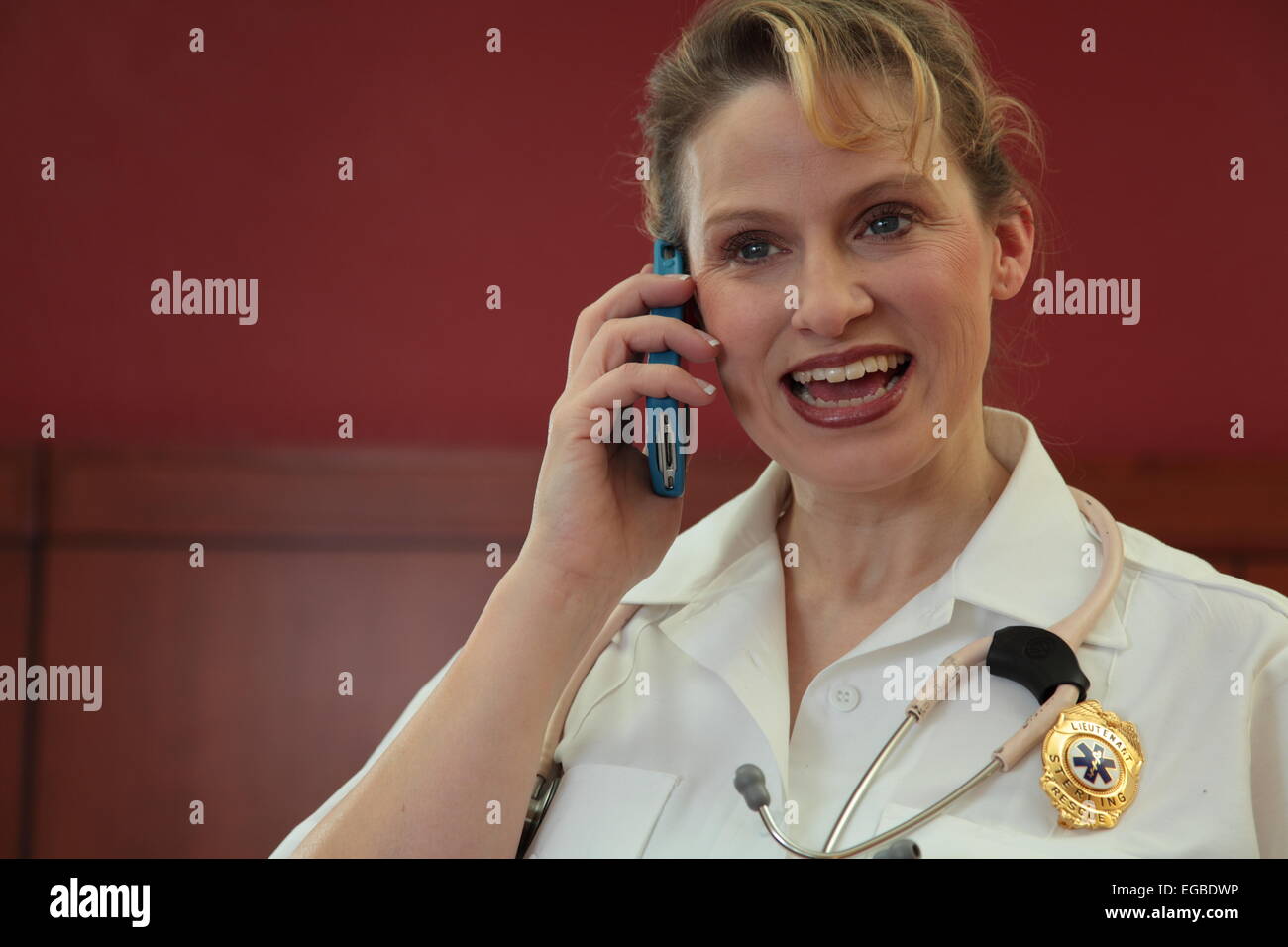 EMT on the phone Stock Photo - Alamy