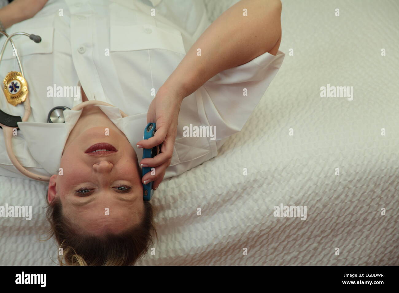 Stressed out EMT on the phone Stock Photo - Alamy