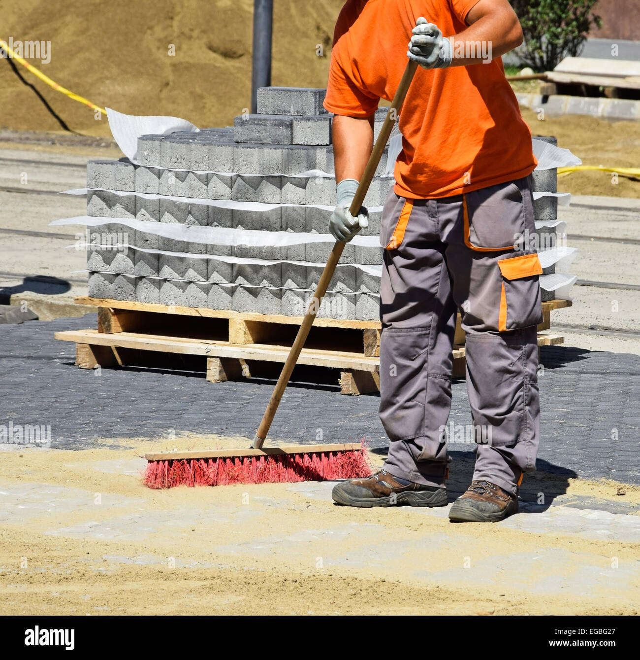 Man is working at the road construction Stock Photo - Alamy