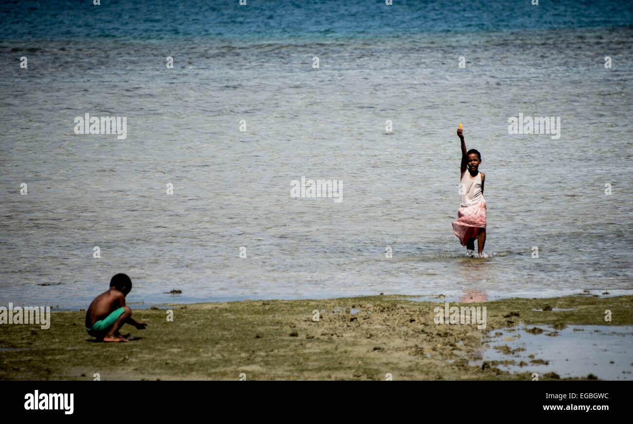 Solevu Village, Malolo Islands, Fiji. 5th Feb, 2015. A giri signals for ...