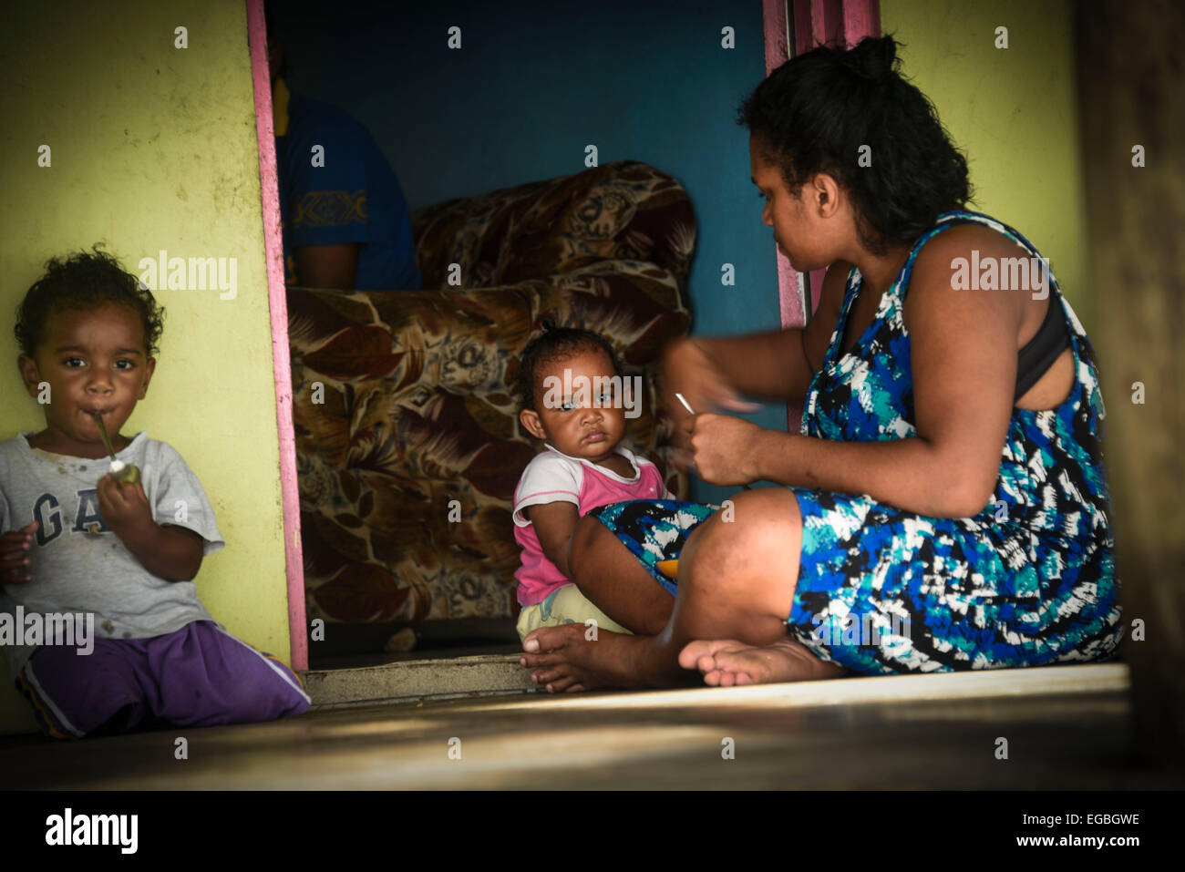 Solevu Village, Malolo Islands, Fiji. 5th Feb, 2015. A family spends ...