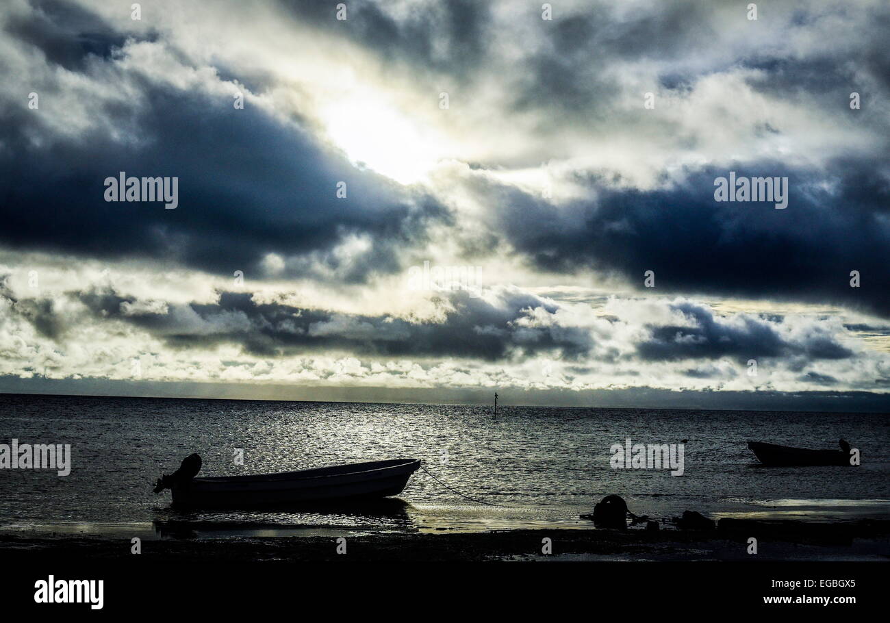 Solevu, Malolo Islands, Fiji. 12th Feb, 2015. Sun rises through the ...