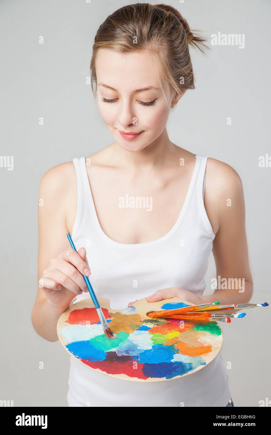 One young woman artist paint palette hi-res stock photography and ...