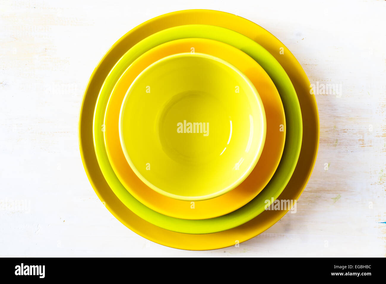Colorful stack of plates for the concept background Stock Photo - Alamy
