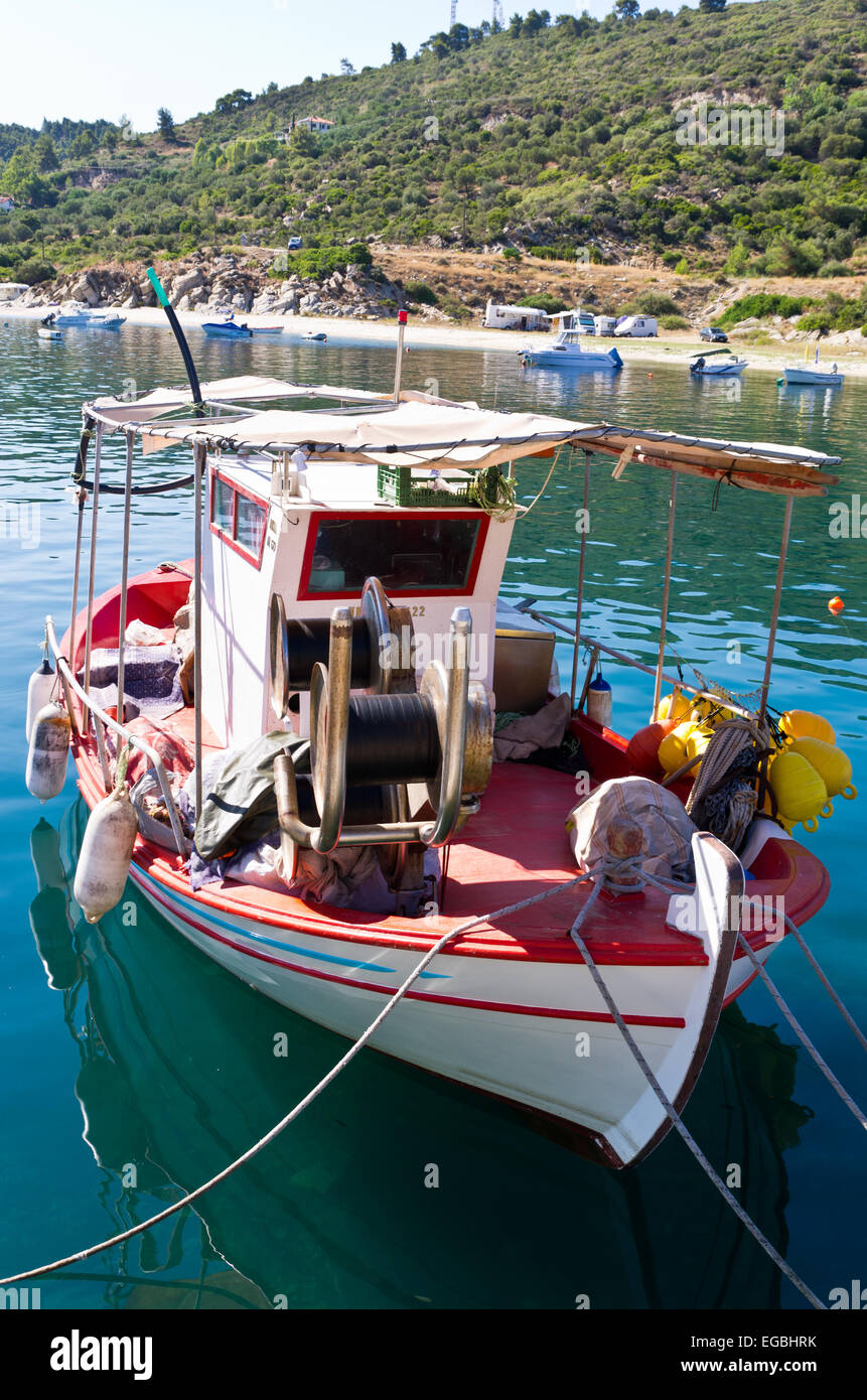 Small and colorful greek fishing boat at harbor Stock Photo - Alamy