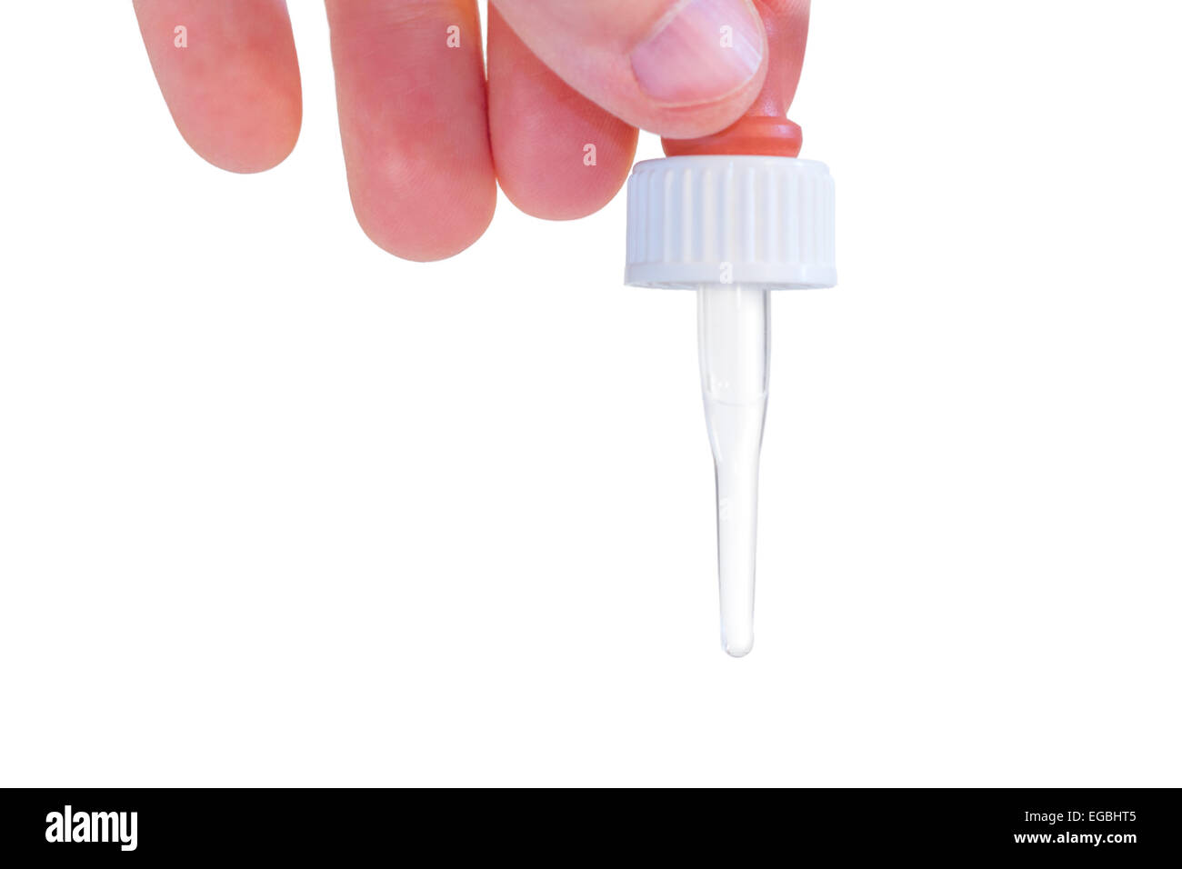 Hand holding a medicine pipette, isolated on white background Stock ...