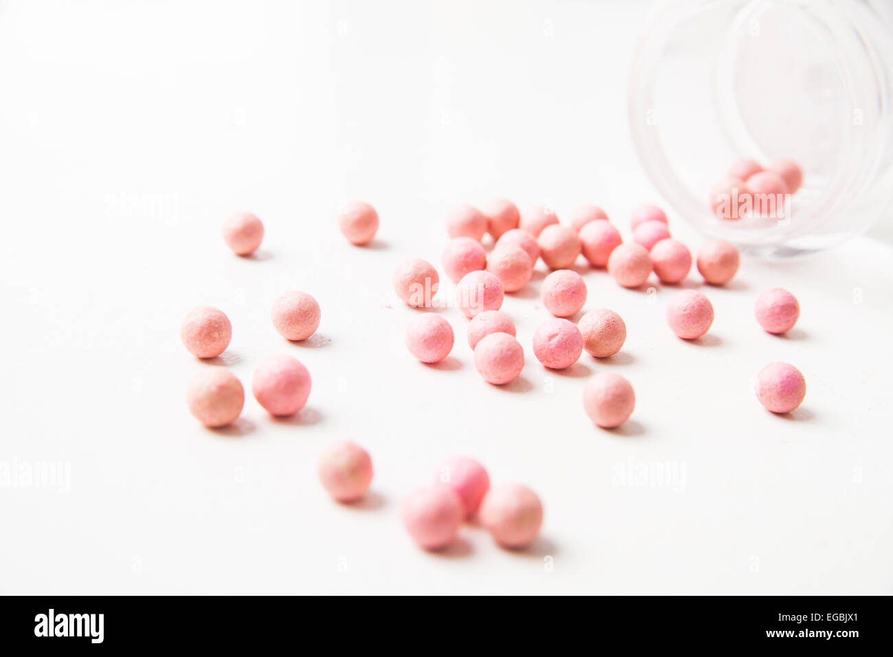 Powder balls isolated on white Stock Photo - Alamy