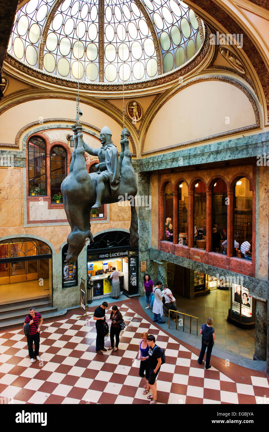 The shopping arcade and atrium in Lucerna Palace with David Cerny's ...