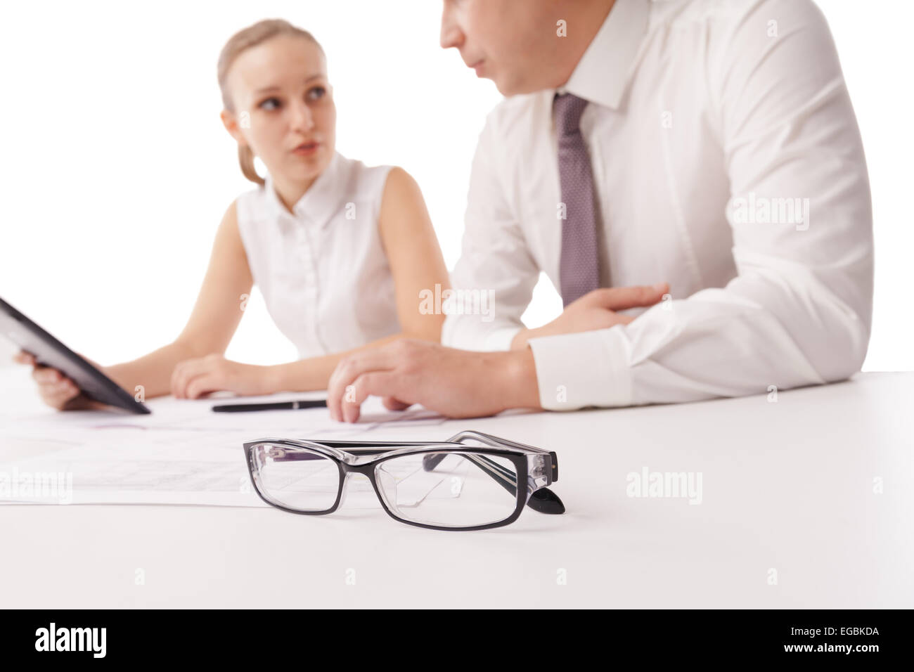 Pair of glasses on office table Stock Photo - Alamy