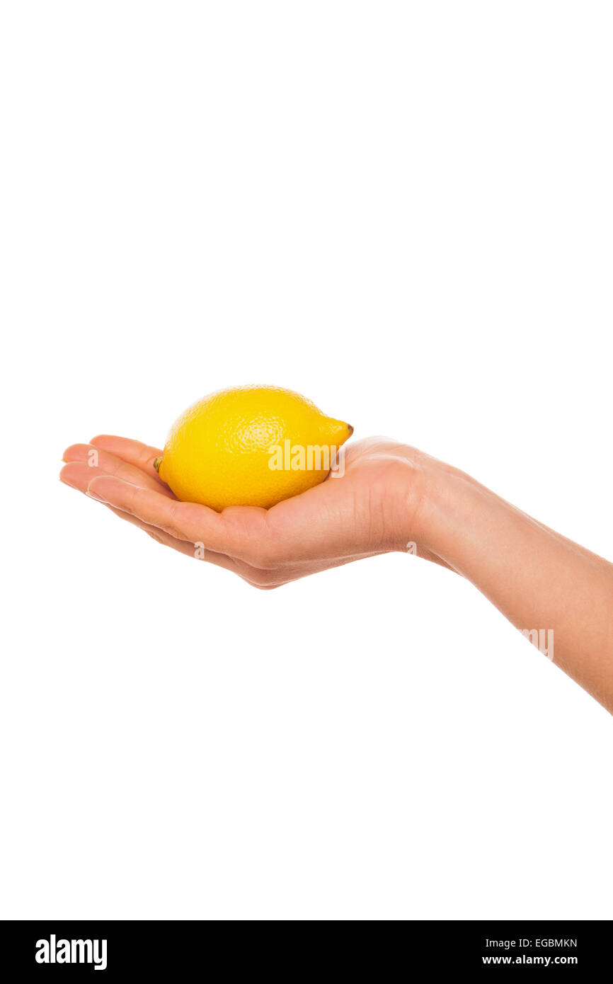 Hand holding lemon isolated on white background Stock Photo - Alamy