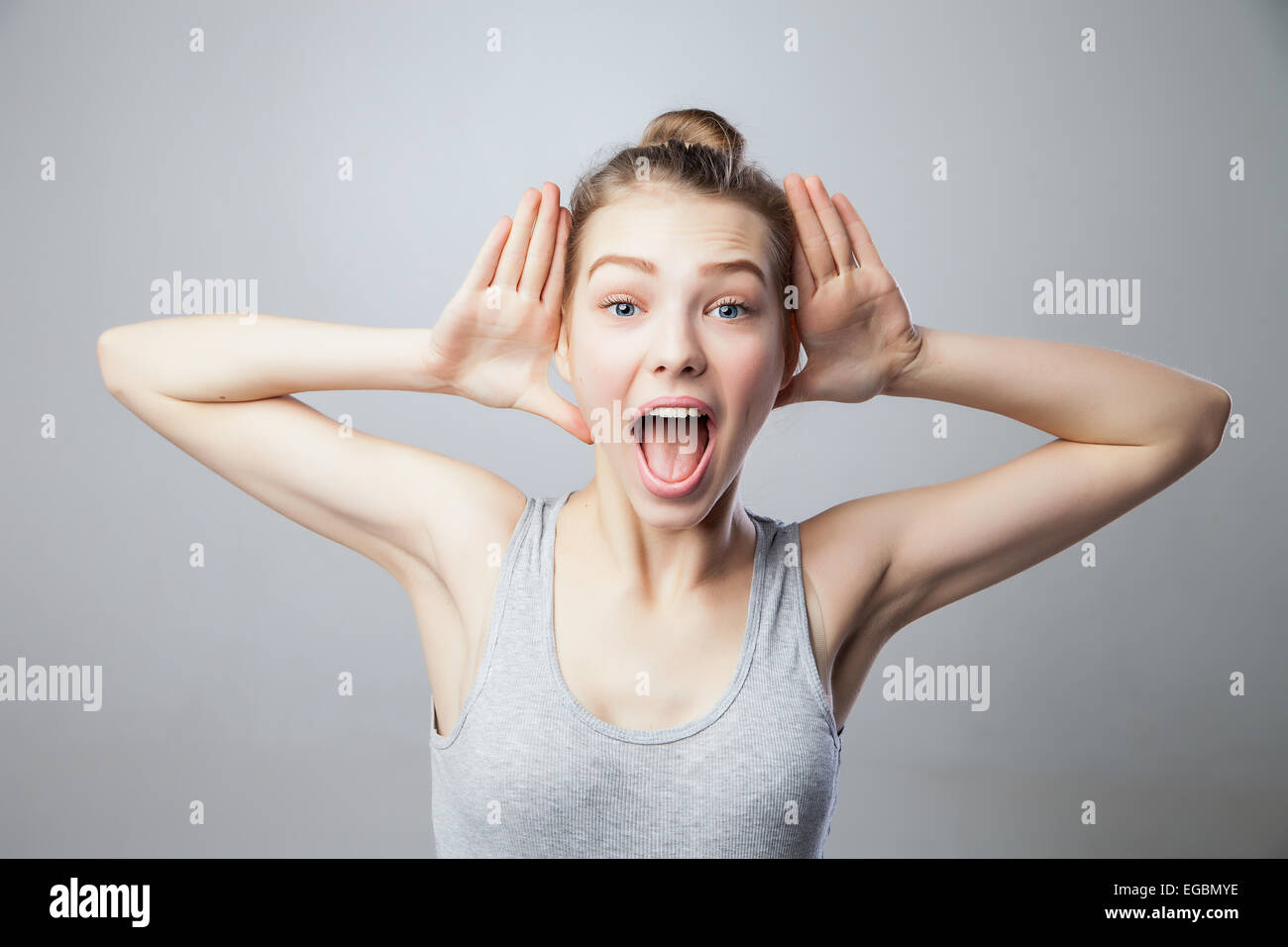 Closeup portrait young woman showing big ears Stock Photo - Alamy