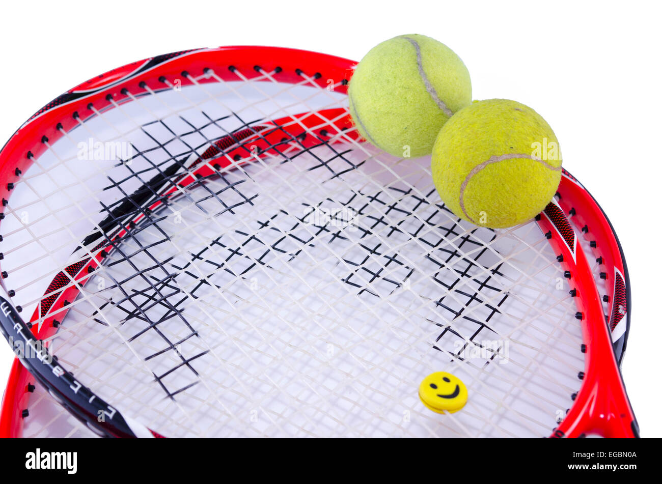 Two tennis rackets with two tennis balls, isolated on white background ...