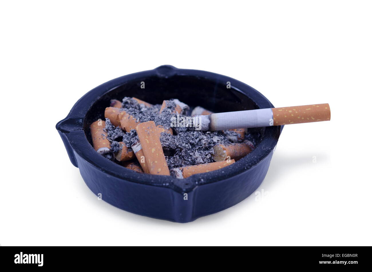 Ashtray filled with cigarette butts and ash, isolated Stock Photo - Alamy