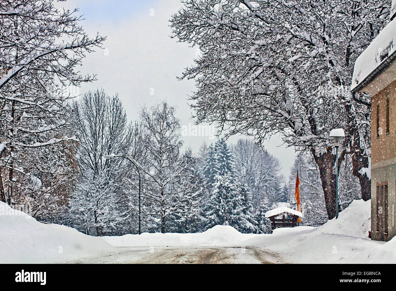 Winter on Austrian mountain routes, heavy snowfall Stock Photo - Alamy