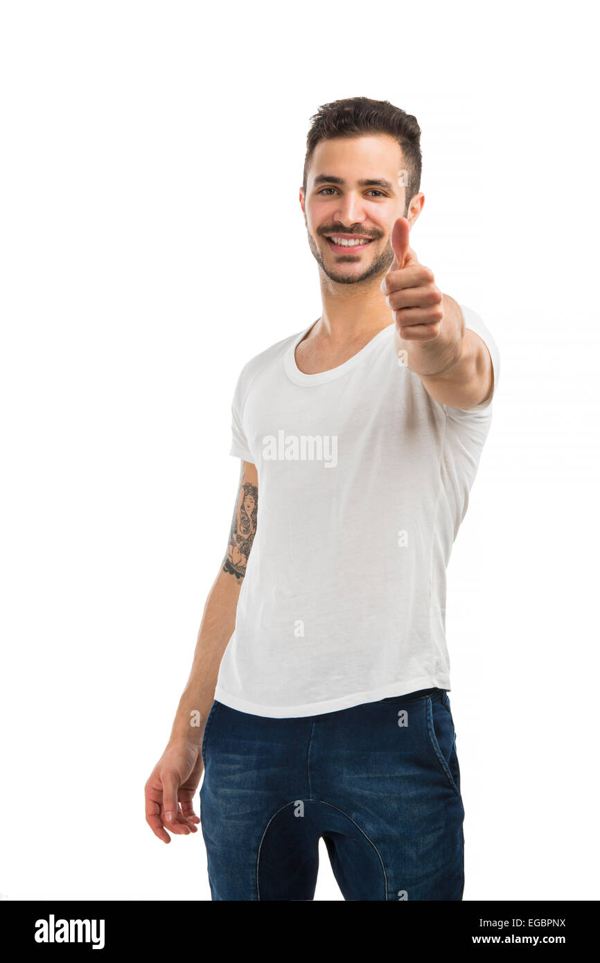 Beautiful and happy man smiling with thumb up Stock Photo - Alamy