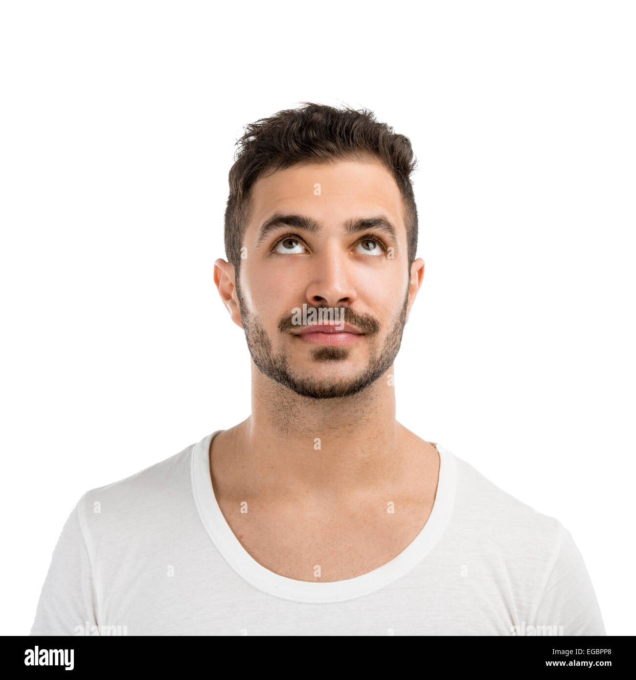 Portrait of a young man looking up, isolated on white Stock Photo - Alamy