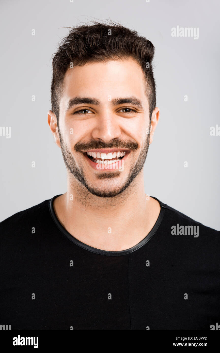 Portrait of a beautiful latin man smiling Stock Photo - Alamy