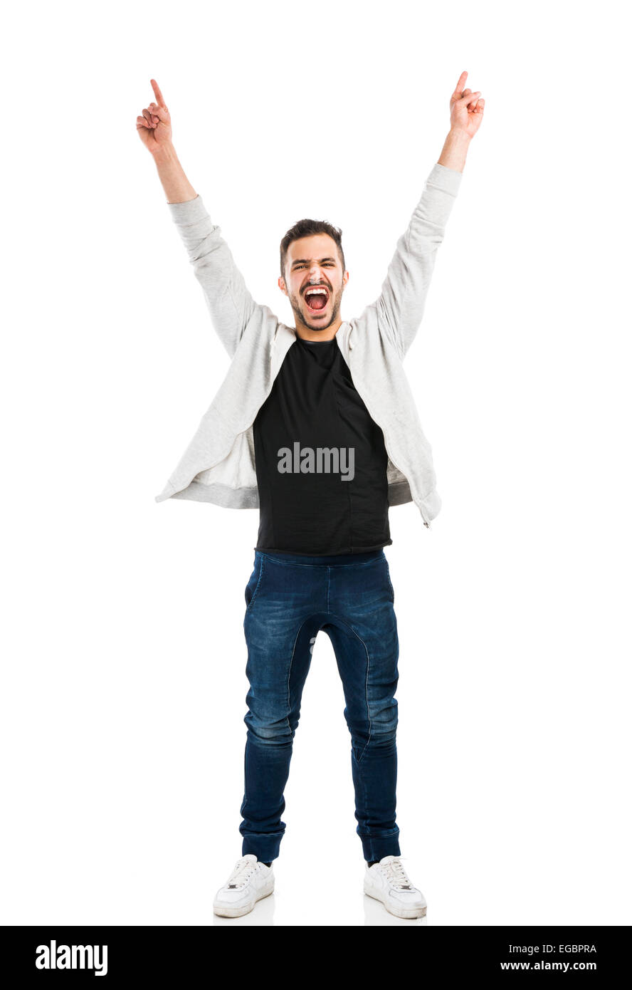 Successful young latin man with arms up Stock Photo - Alamy
