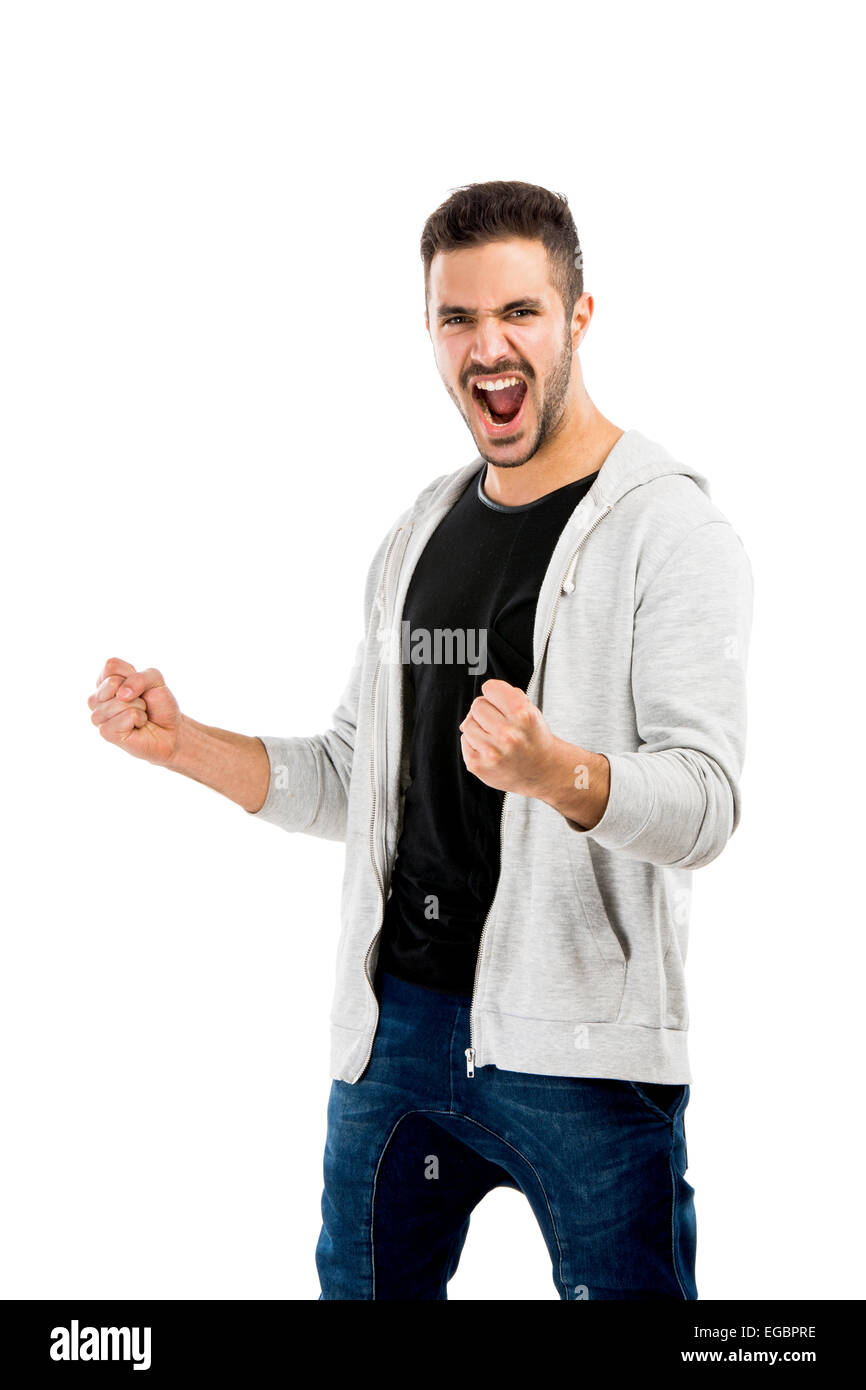 Angry young latin man with arms up Stock Photo - Alamy