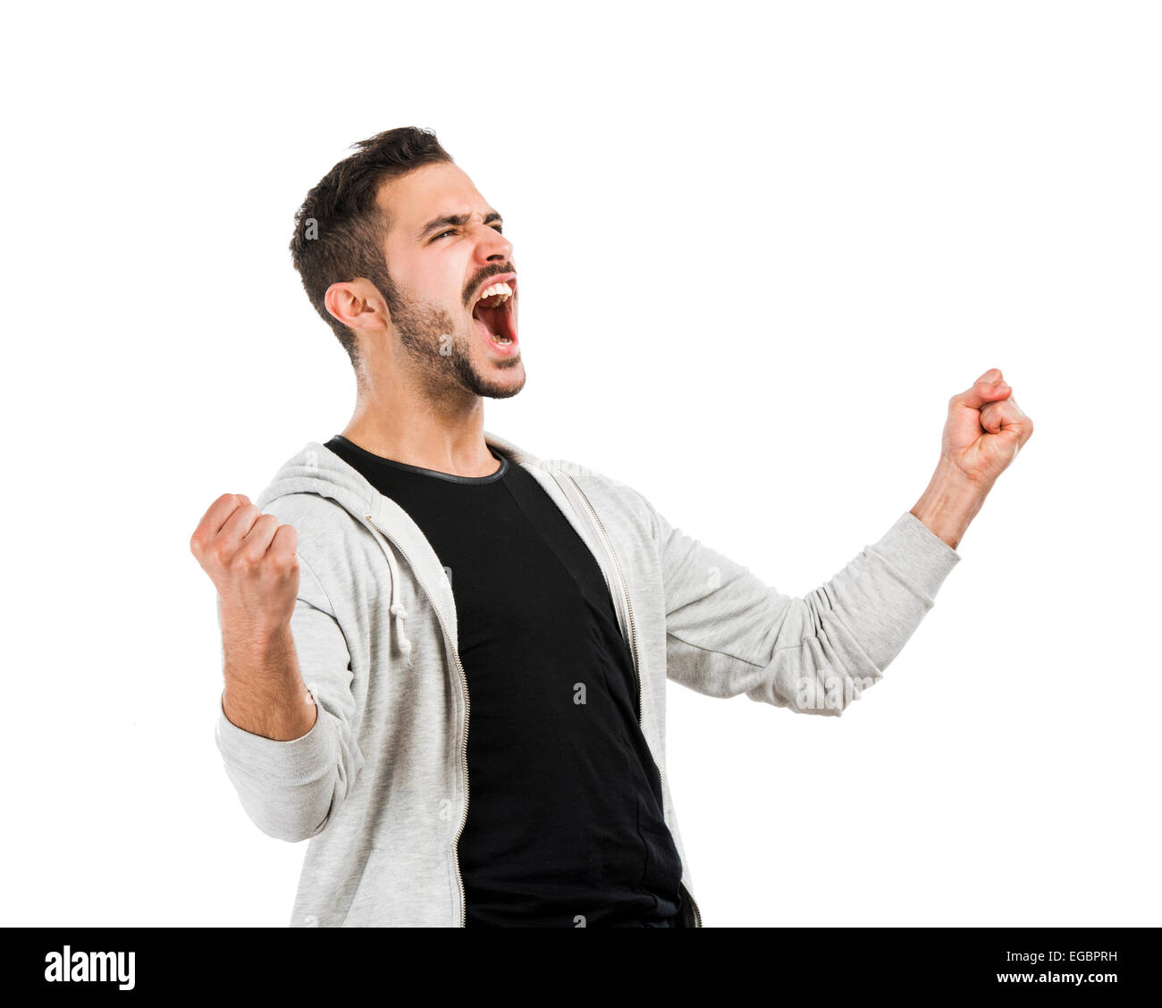 Angry young latin man with arms up Stock Photo - Alamy