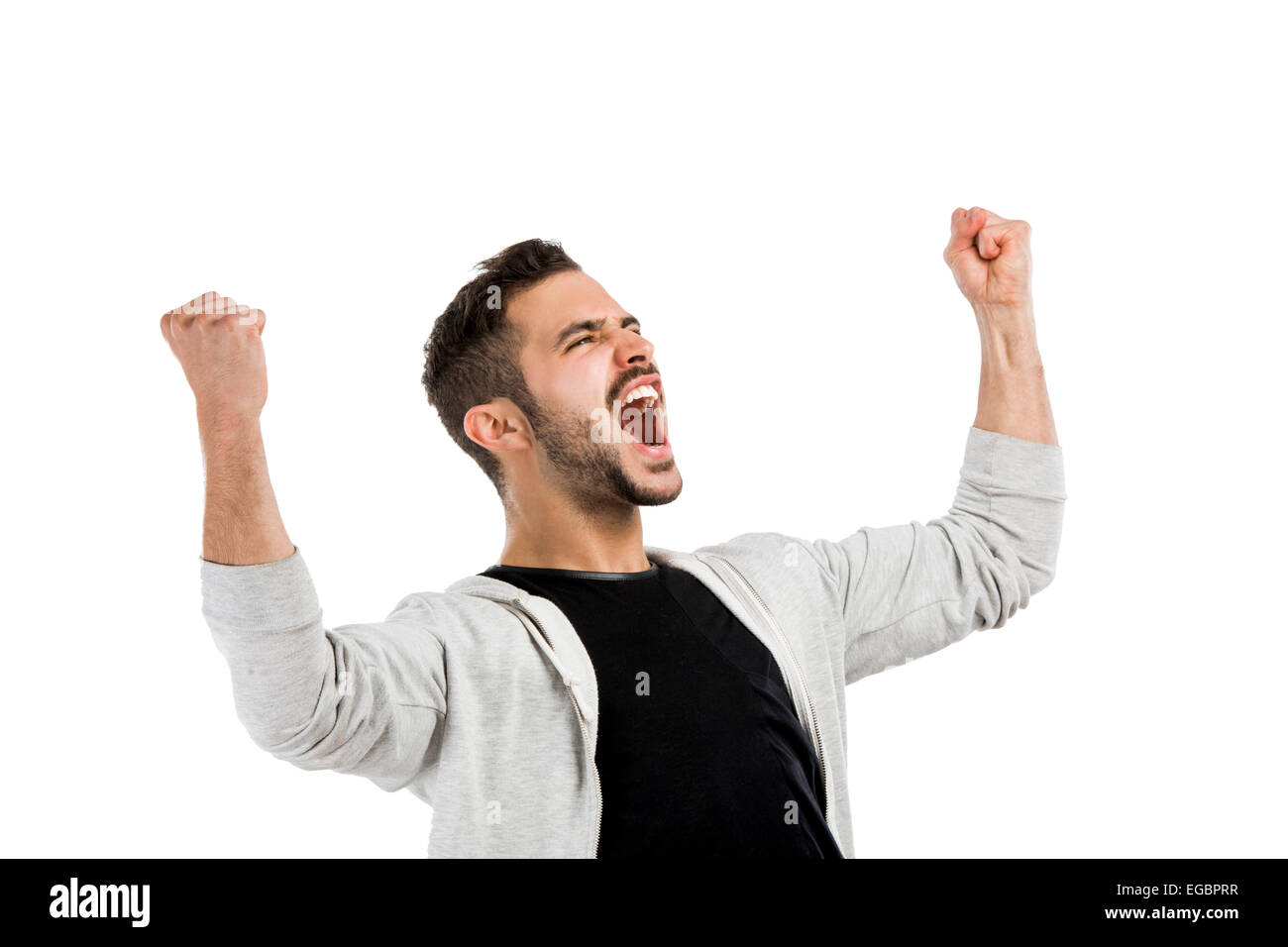 Successful young latin man with arms up Stock Photo - Alamy