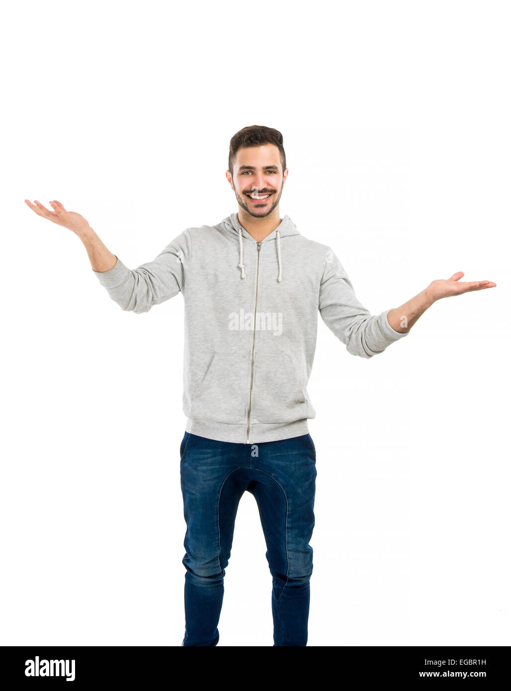 Happy young man making a scale with his own hands Stock Photo - Alamy