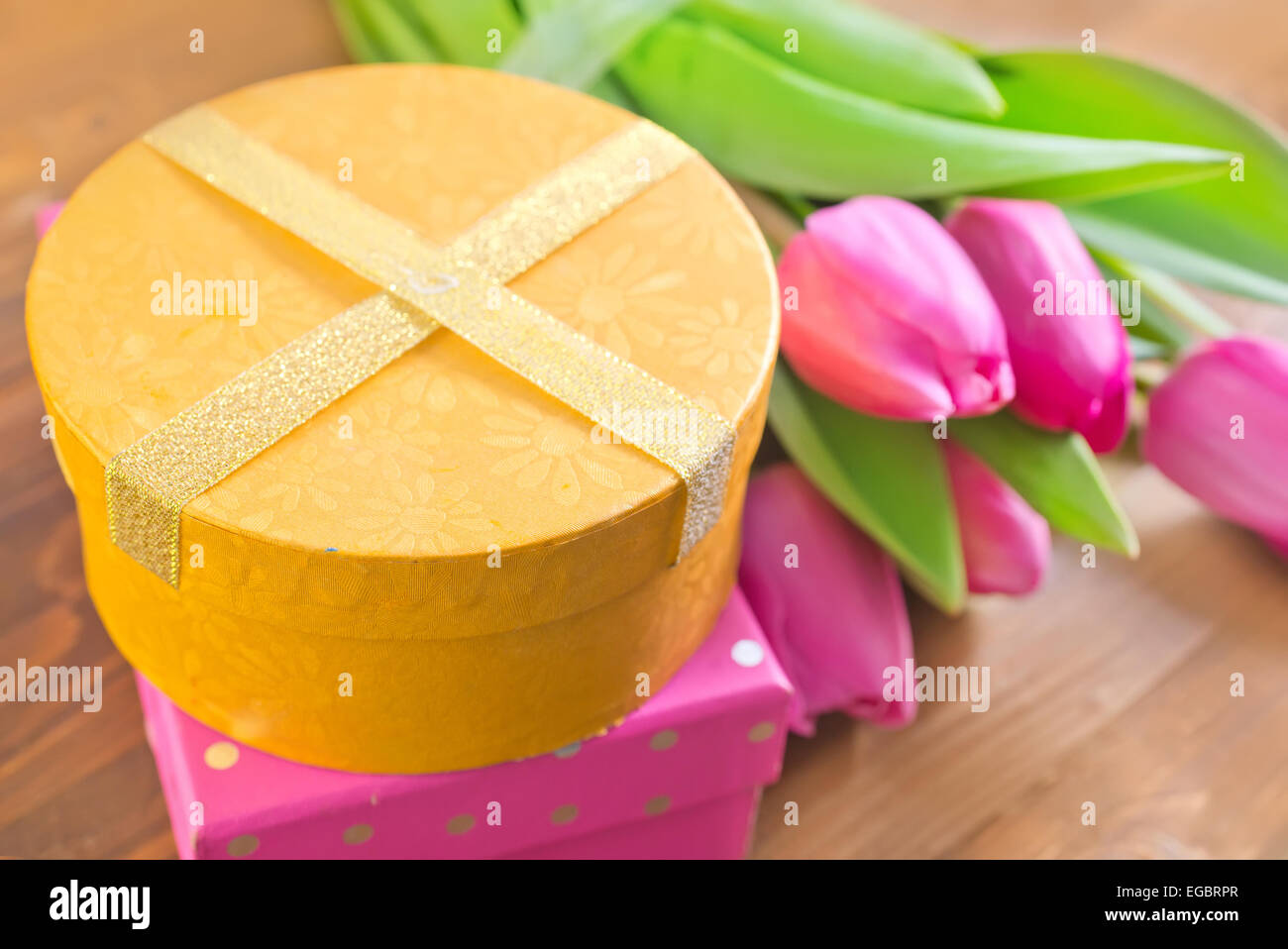 present and tulips Stock Photo - Alamy