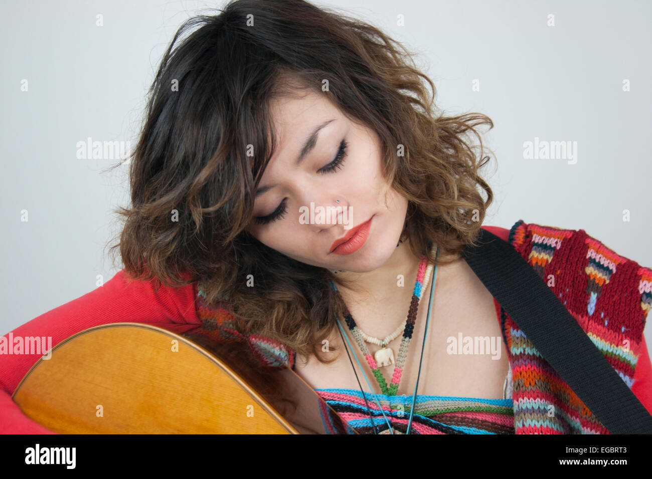 Hattie Marsh beautiful musician playing guitar Stock Photo - Alamy