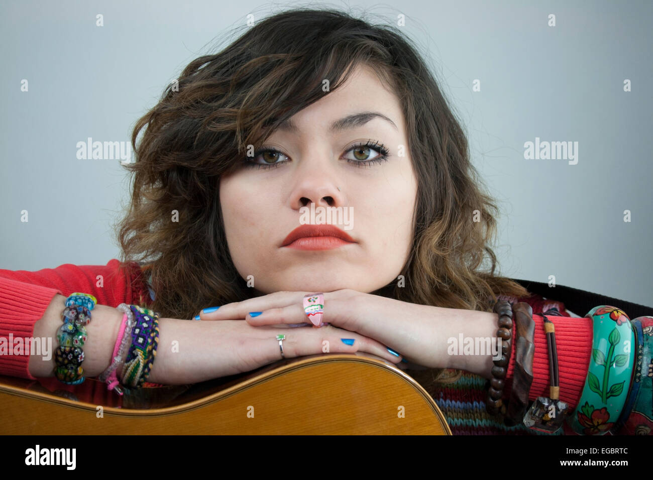 Hattie Marsh beautiful young musician modeling over a guitar Stock ...