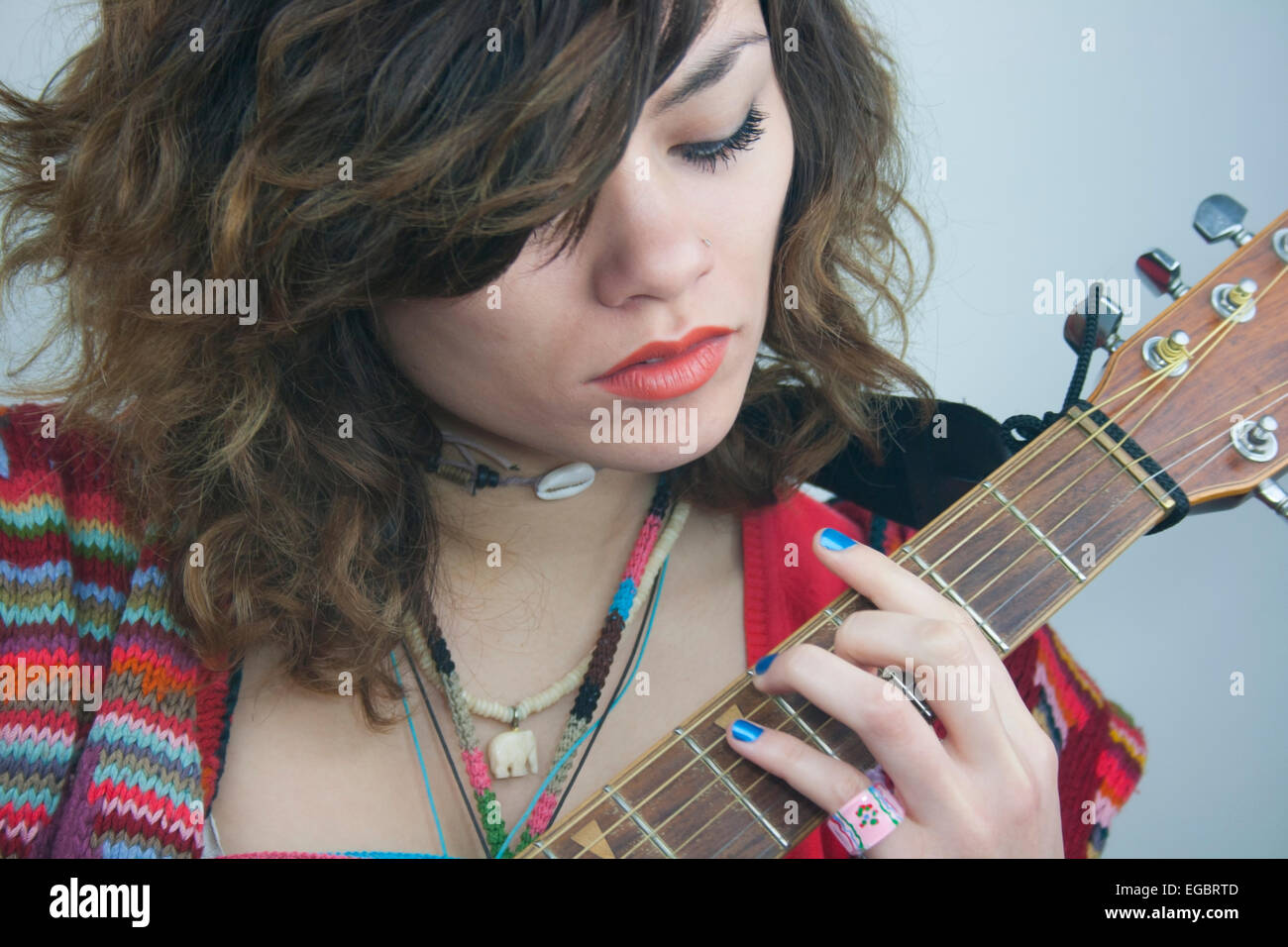 Hattie Marsh beautiful young musician playing a guitar Stock Photo - Alamy