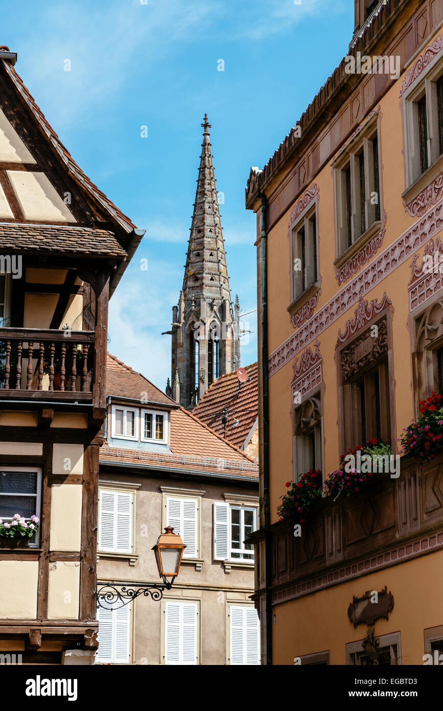 Buildings in Obernai, Alsace, France with steeple of Eglise Saints ...