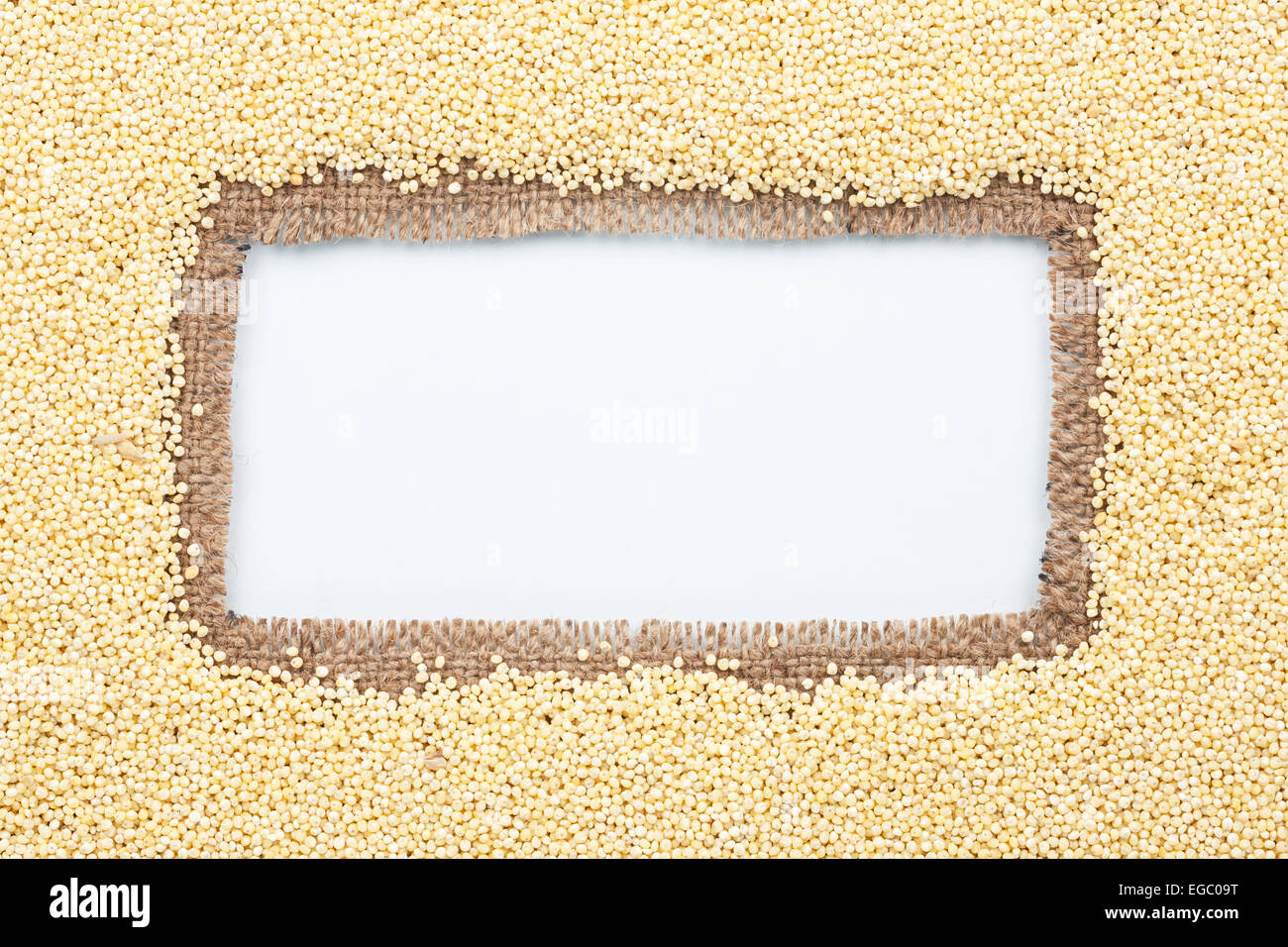 Frame made of burlap with millet, on a white background Stock Photo - Alamy