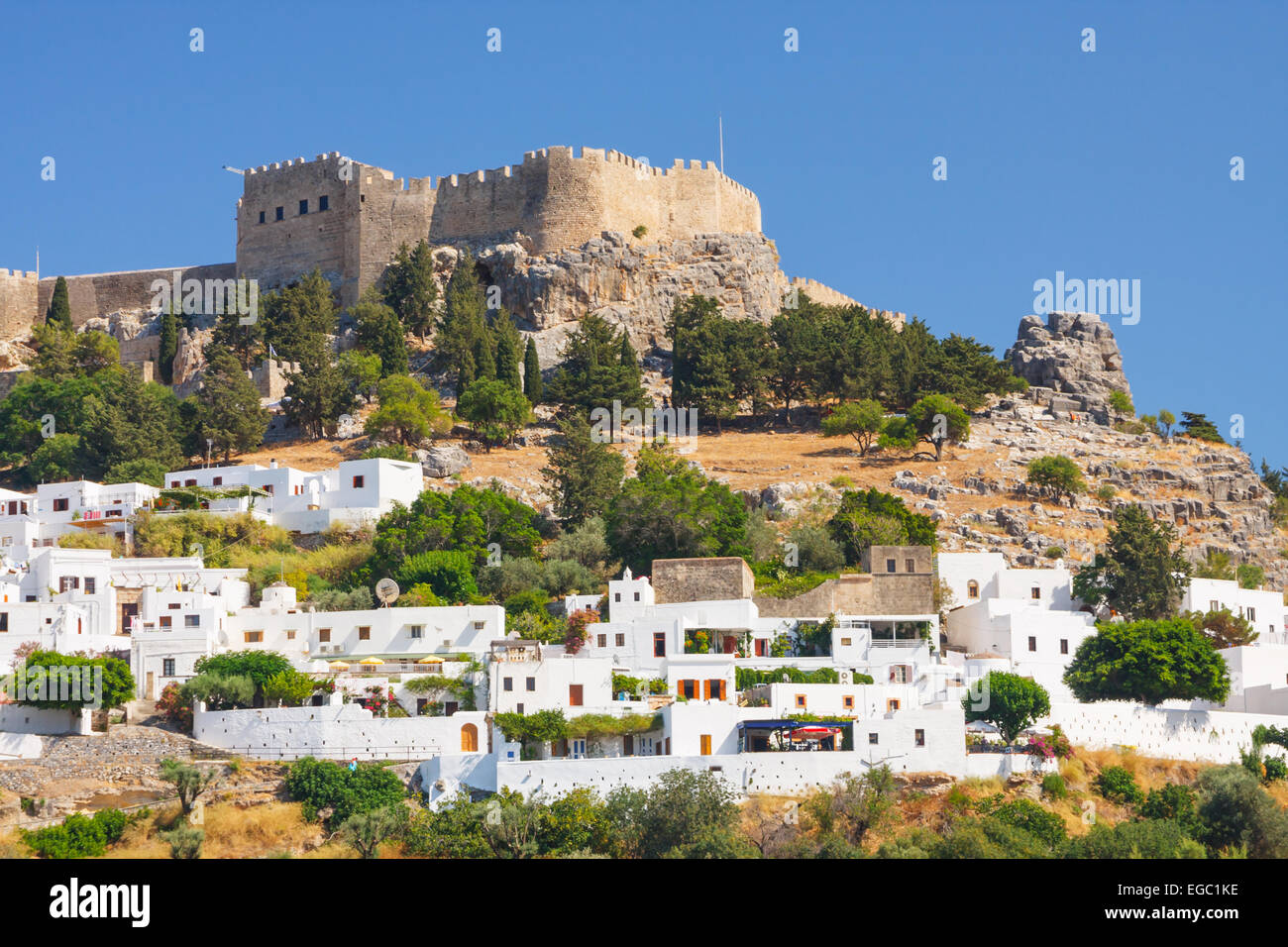 Lindos, castle above on the Greek Island of Rhodes Stock Photo - Alamy