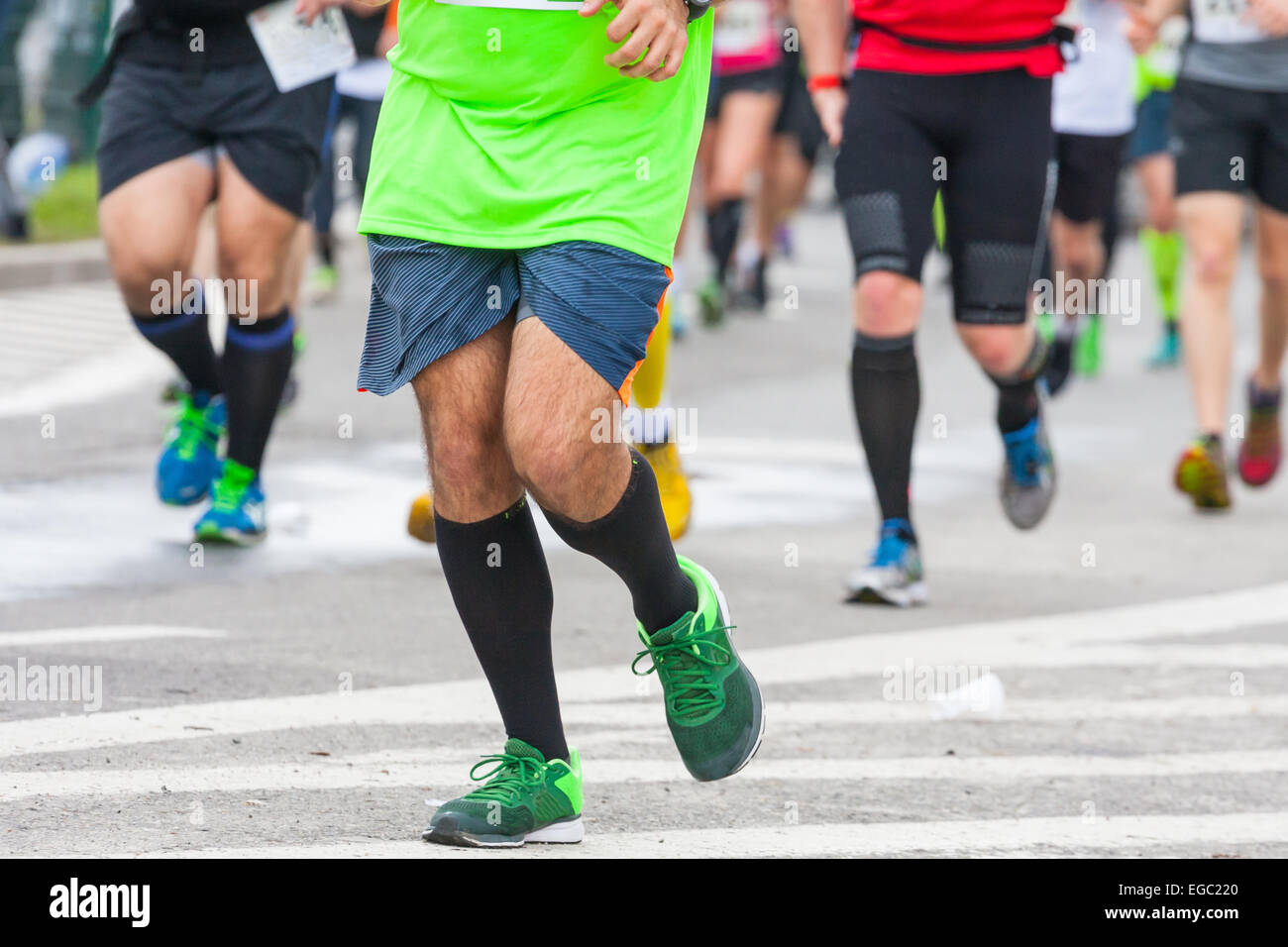 detail of the legs of runners at the start of a marathon race Stock ...